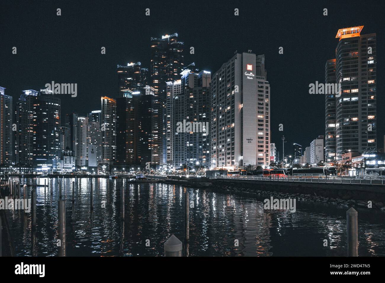 A skyline of Busan at bay 101 at night with colourful skyscrapers Stock ...