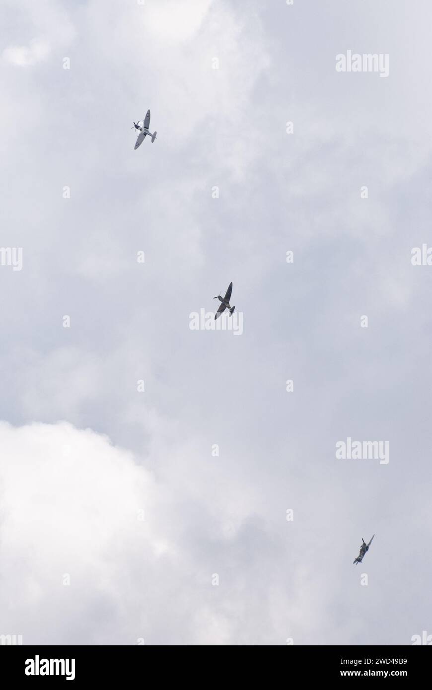 Spitfire formation dogfight in the clouds at flying legends airshow in ...