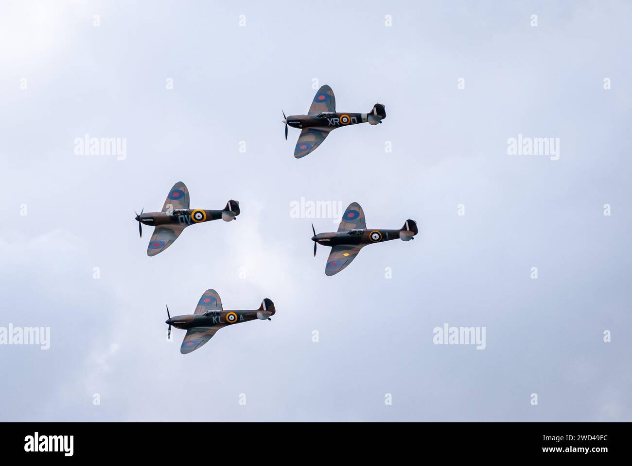 Spitfire formation dogfight in the clouds at flying legends airshow in ...