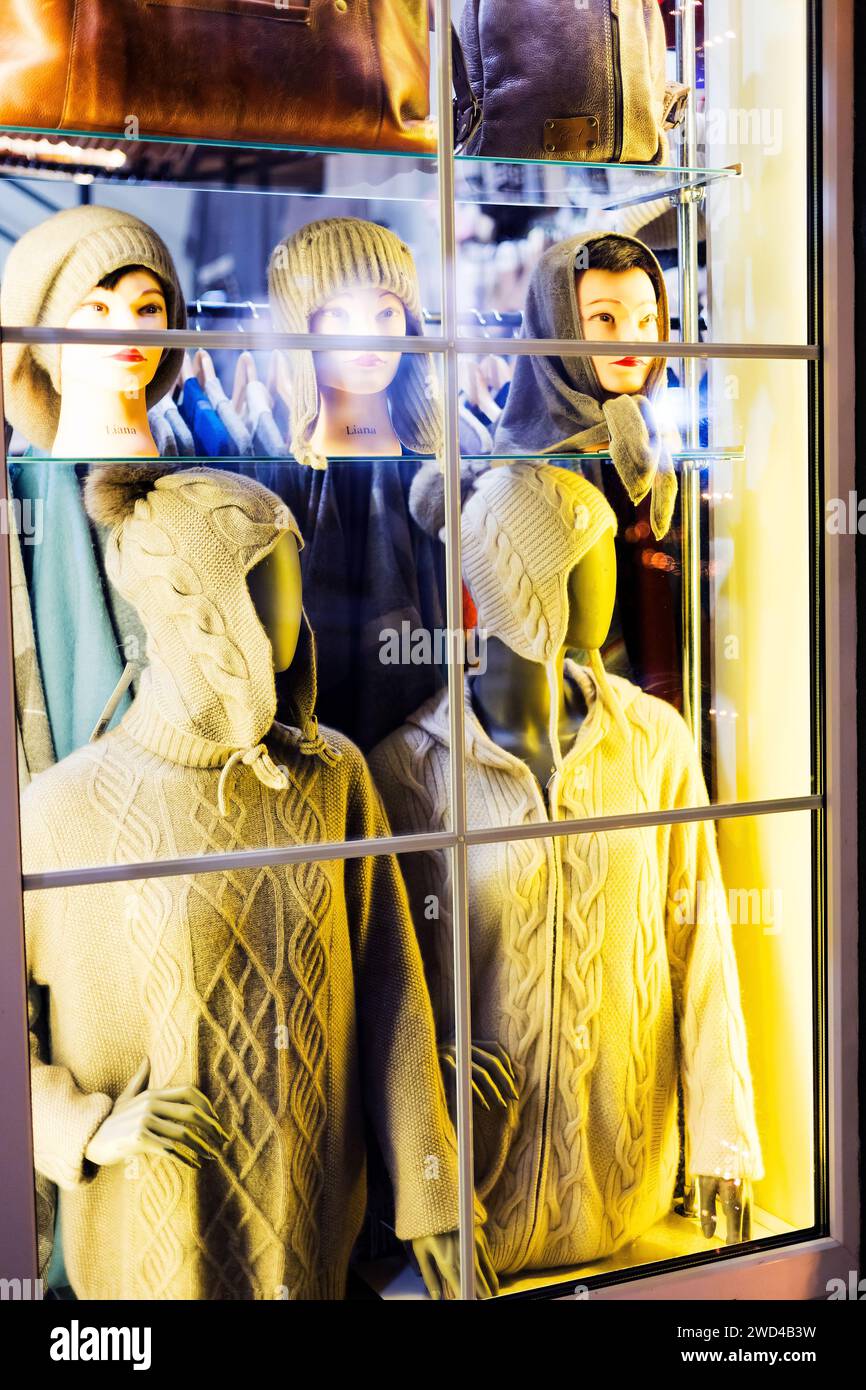 Two mannequins in shop window. Female and male dummies. Family shopping ...