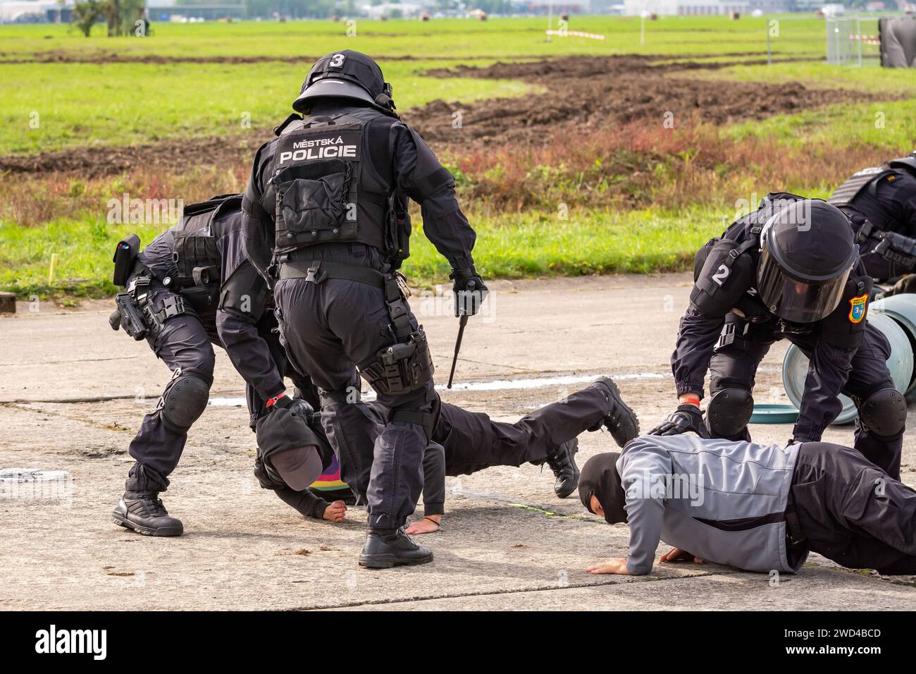 Police officers arresting protesters during a riot. Czech Republic city ...