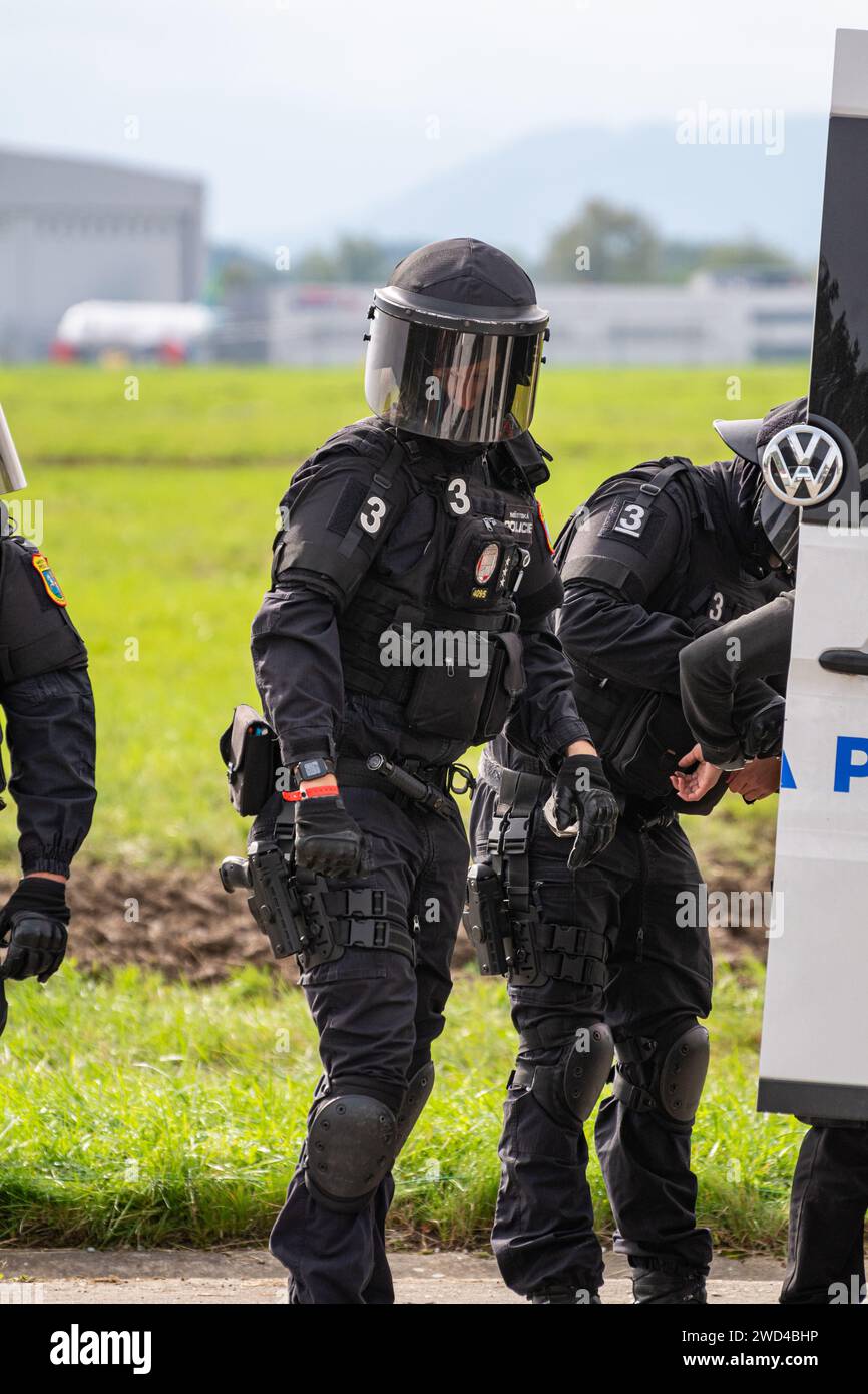 Police officers arresting protesters during a riot. Czech Republic city ...