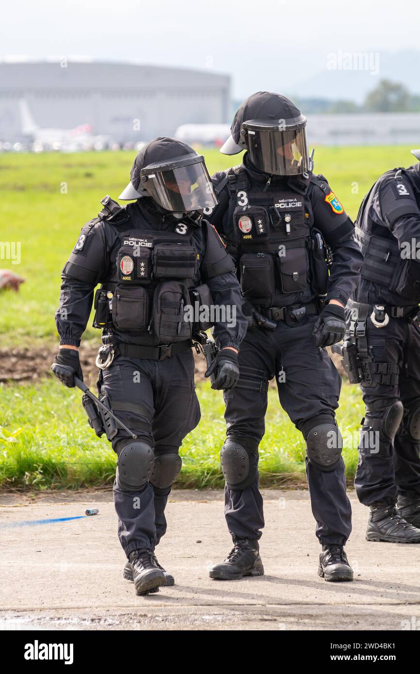 Police officers arresting protesters during a riot. Czech Republic city ...