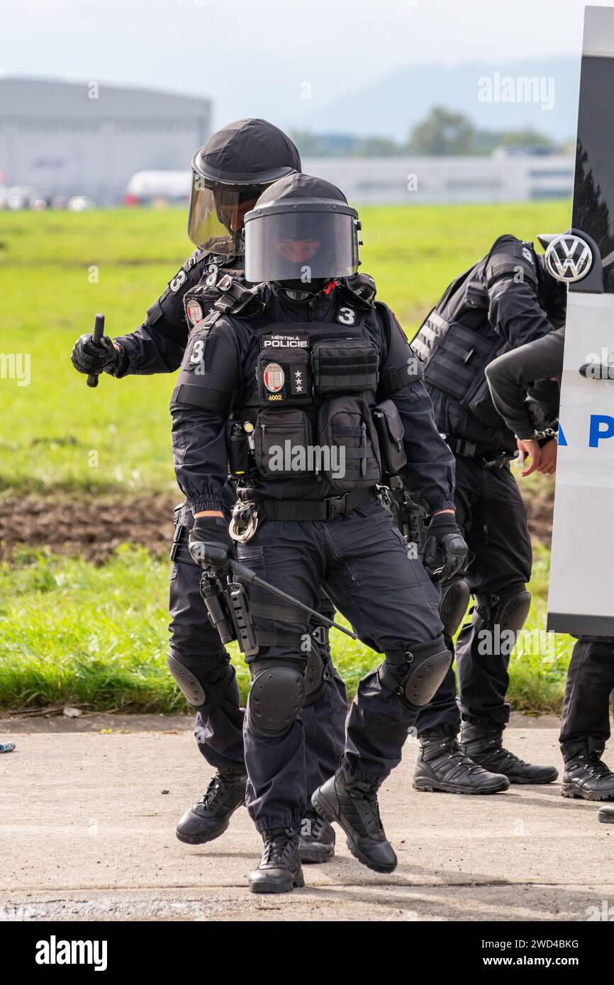Police officers arresting protesters during a riot. Czech Republic city ...