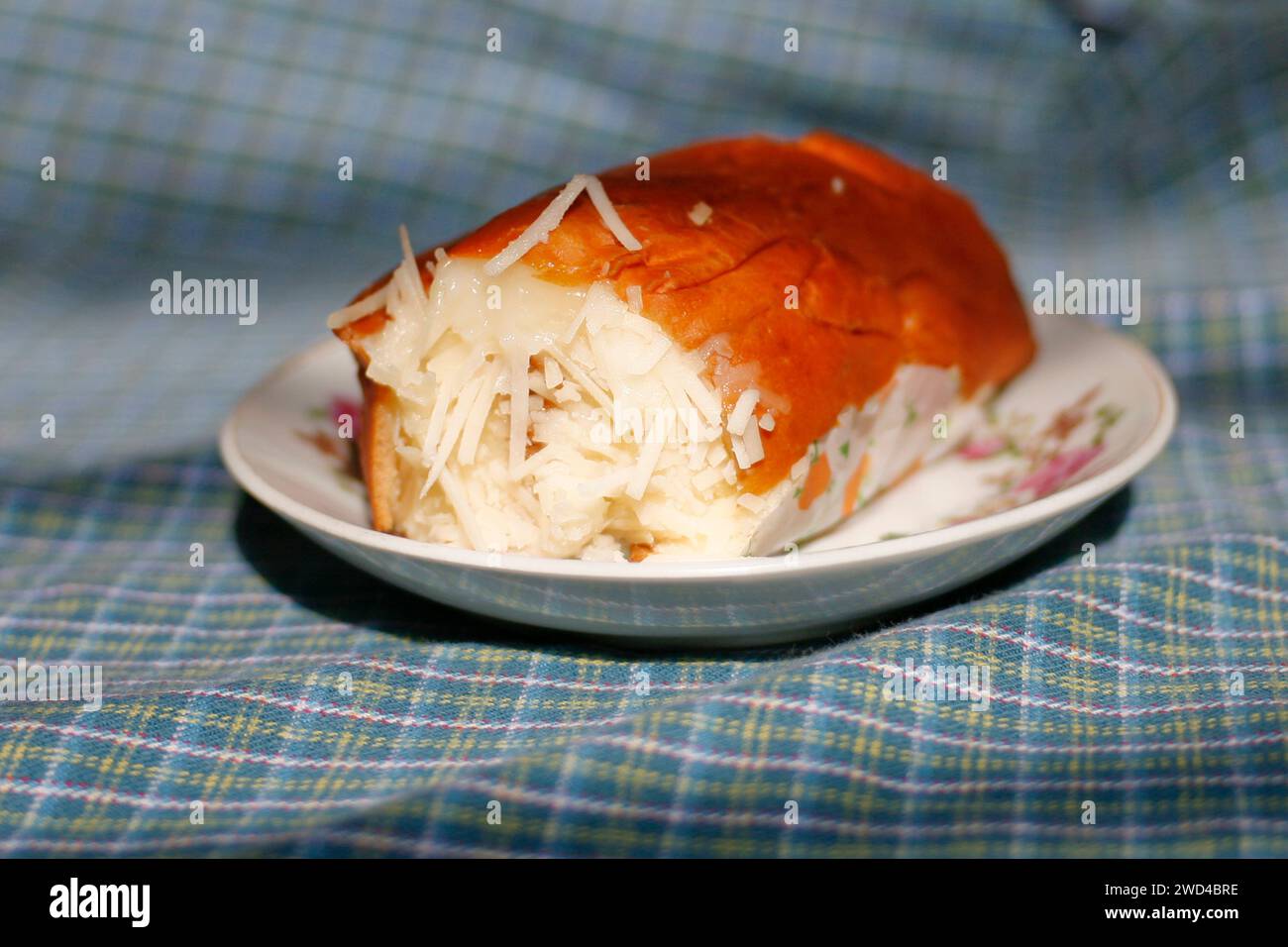 Grated cheese on plate hi-res stock photography and images - Alamy