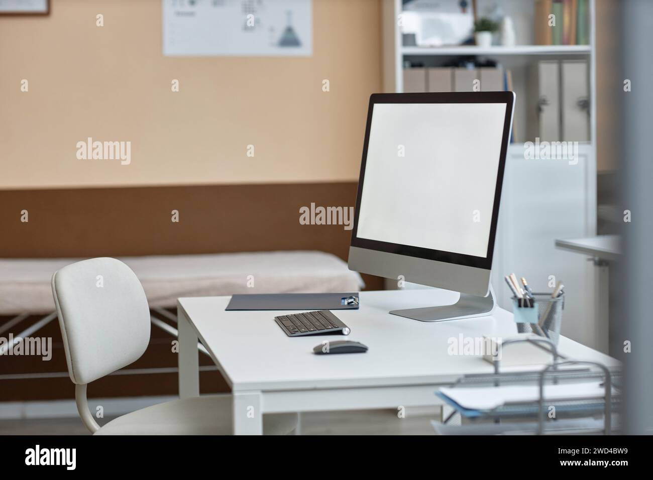 Operating Computer on Desktop in Doctors Office Stock Photo - Alamy
