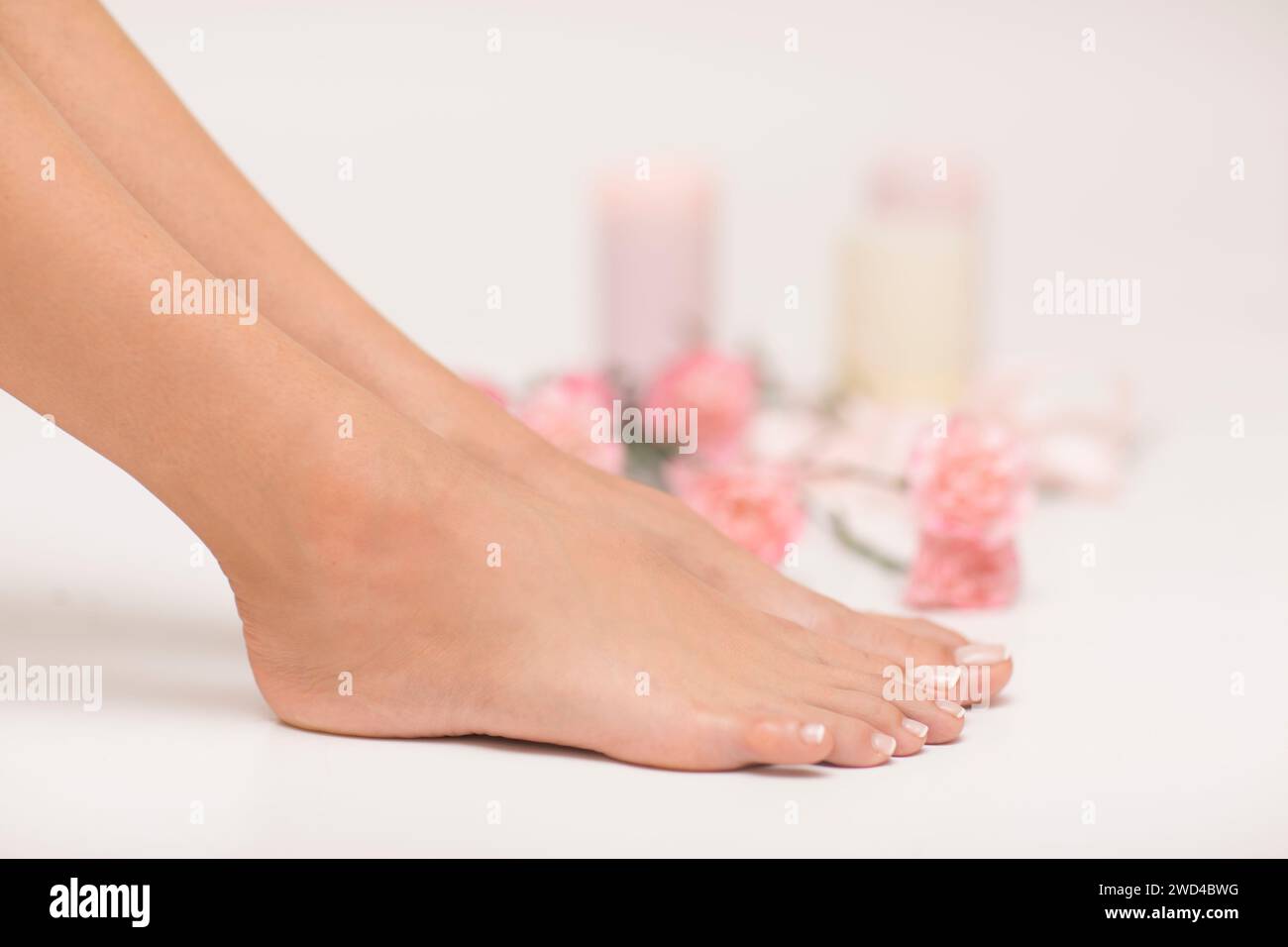 The picture of ideal done manicure and pedicure. Female hands and legs ...