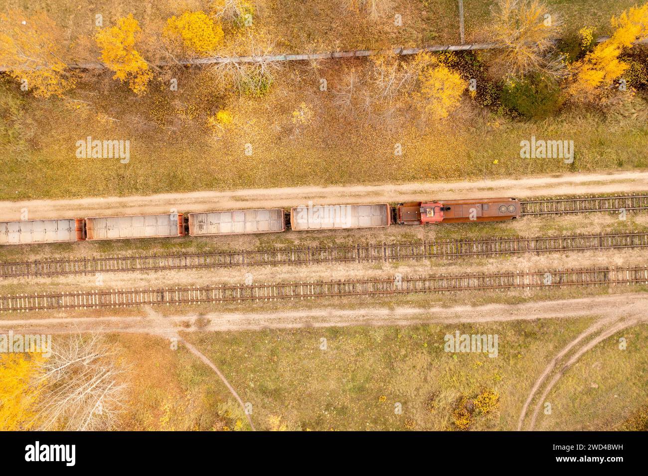 Drone photography of empty train near a industrial complex during ...