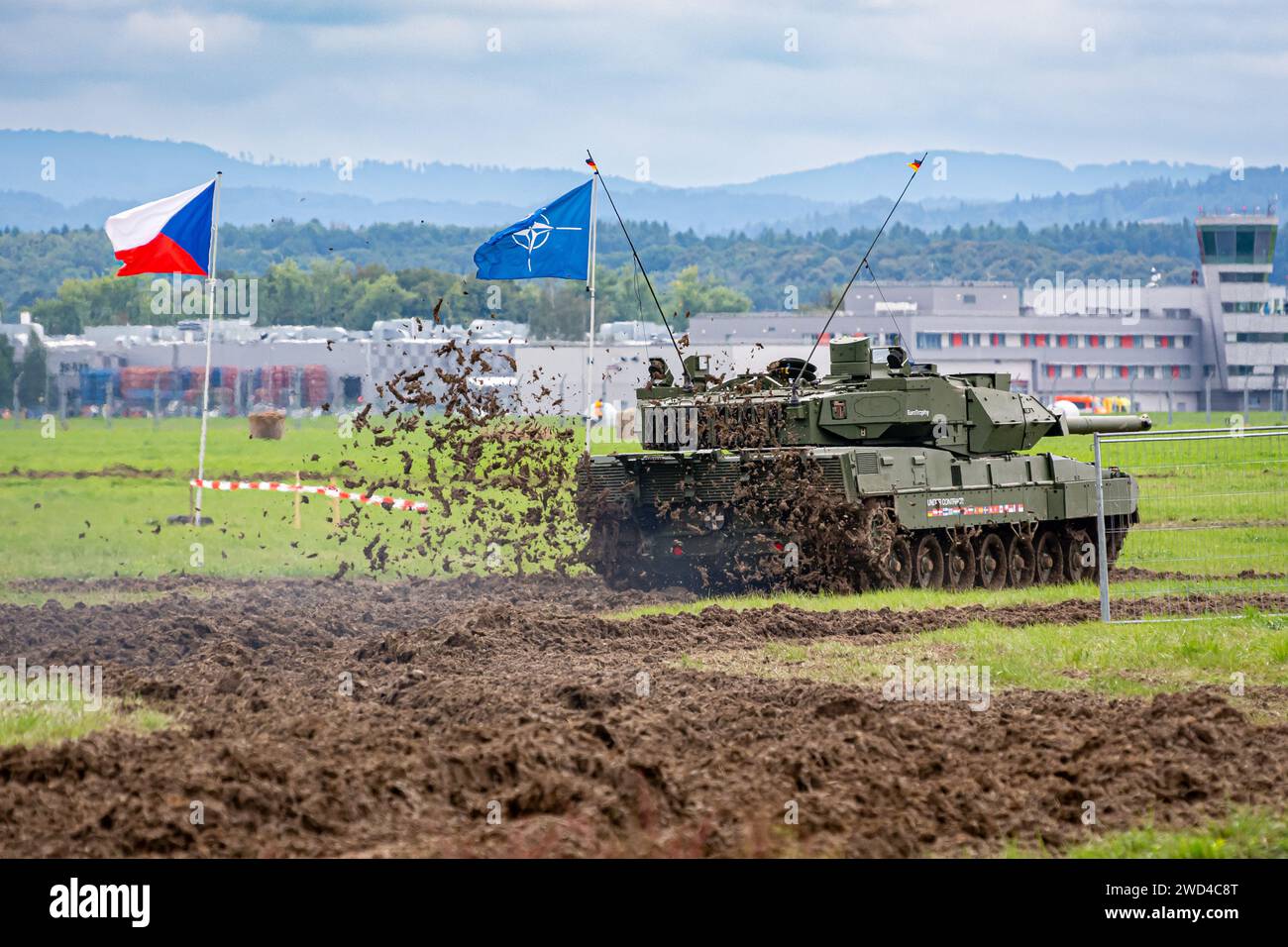 NATO tank The German made Leopard 2 A7 driving in front of Czech flag ...