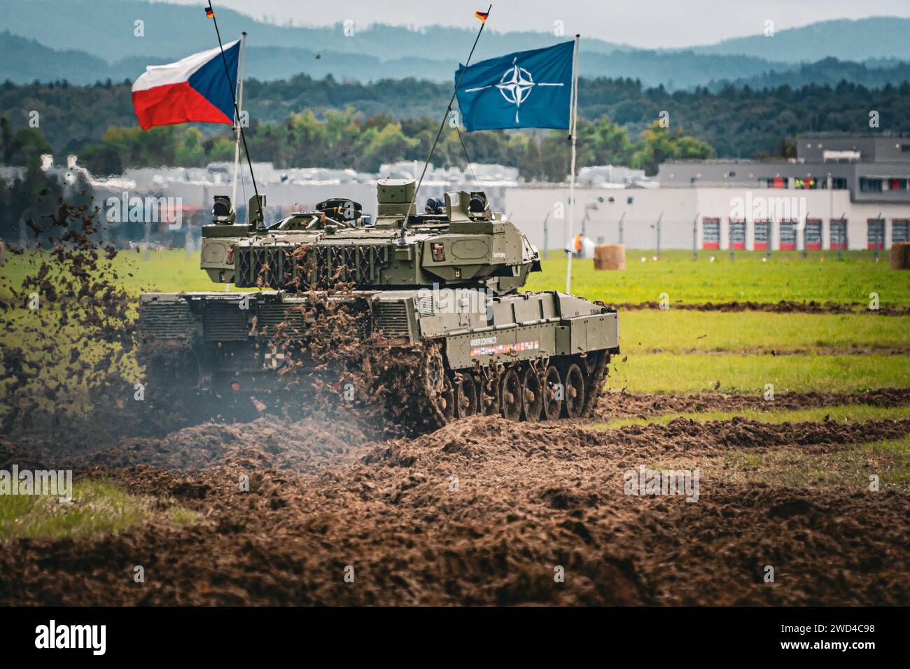 NATO tank The German made Leopard 2 A7 driving in front of Czech flag ...