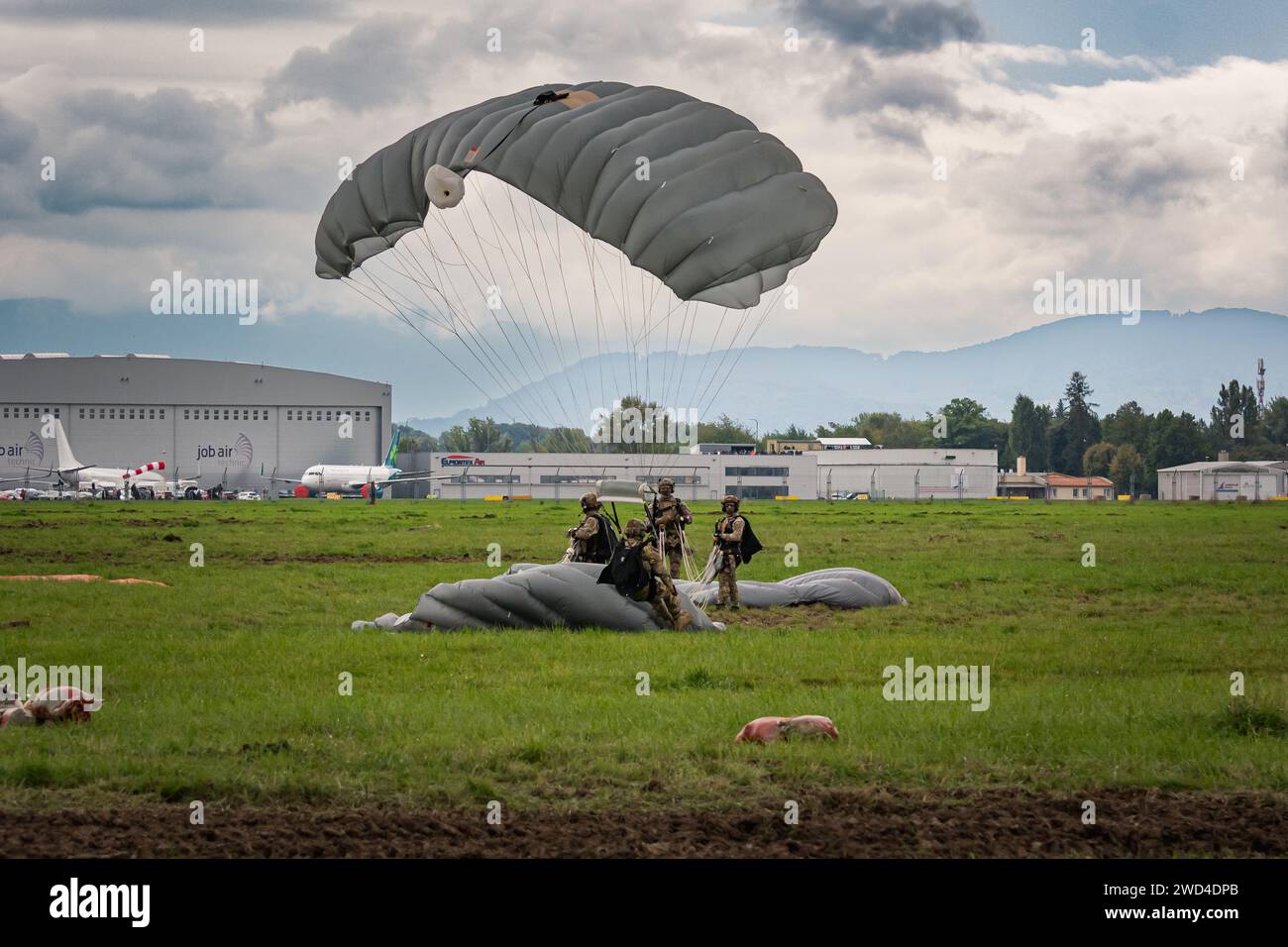 Polish special forces (JW AGAT) paratroopers landing with parachutes on ...