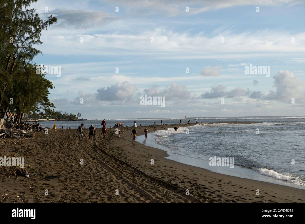 Tourists enjoying the Etang-Salé beach on Réunion Island. The island, located in the Indian ...