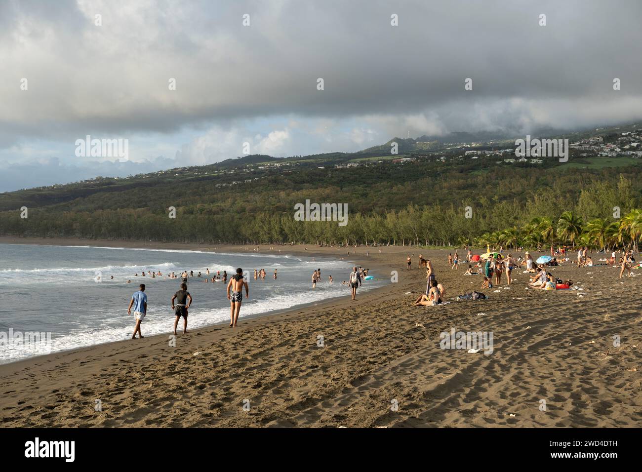 Tourists enjoying the Etang-Salé beach on Réunion Island. The island, located in the Indian ...