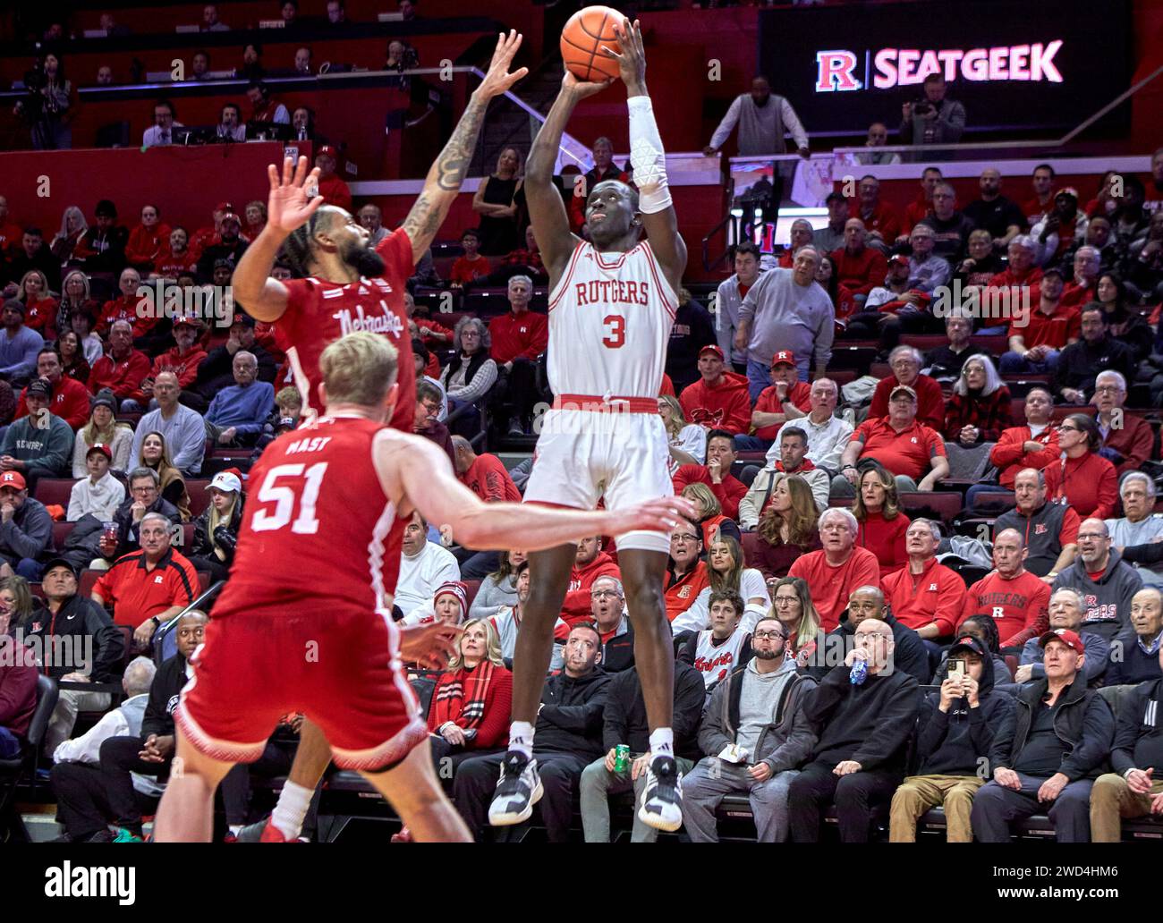 Rutgers Scarlet Knights forward Mawot Mag (3) shoots a three pointer ...