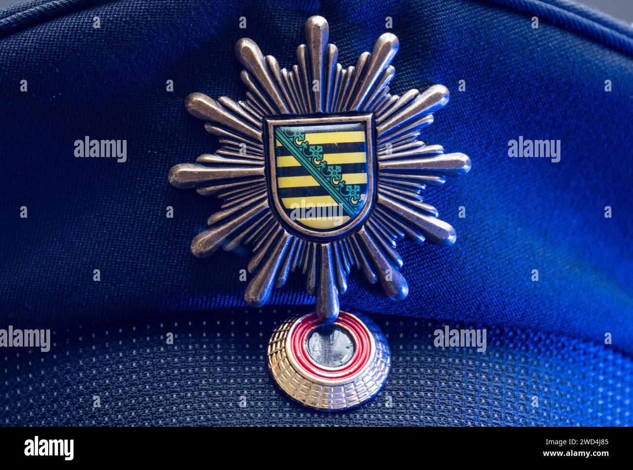 Dresden, Germany. 18th Jan, 2024. The coat of arms of the Saxon police ...