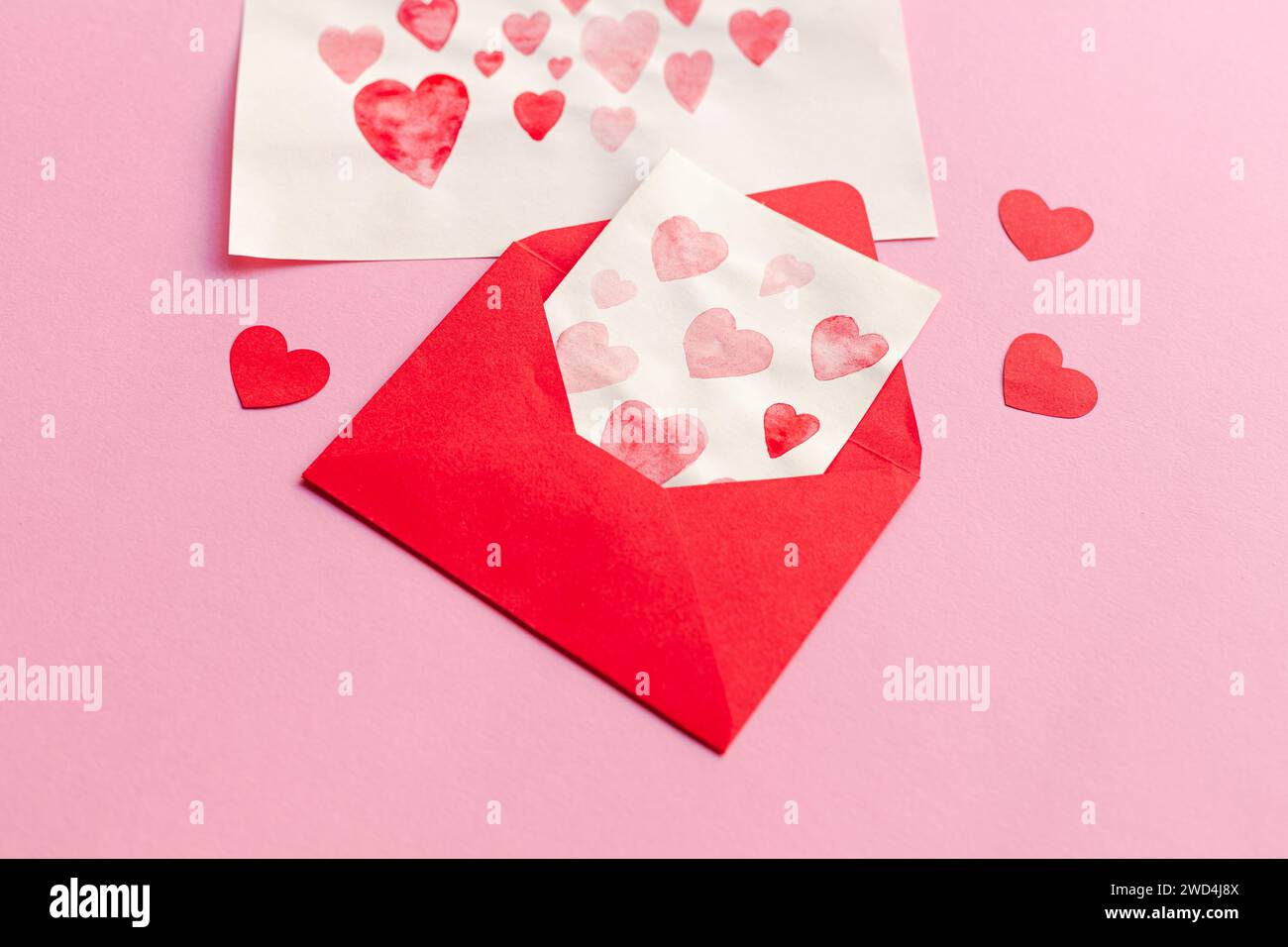Two Valentine's Day cards, one adorned with hearts and the other with a ...