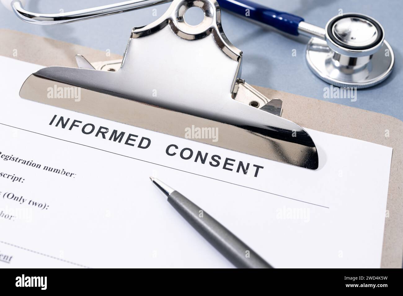 Informed Consent form and stethoscope on desk Stock Photo - Alamy
