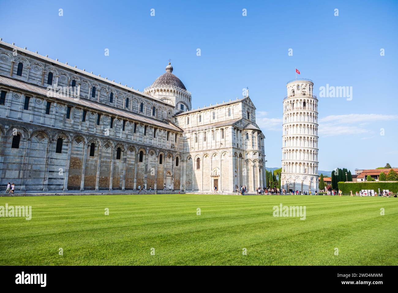 Pisa, Italy - 29 June 2023: Famous Leaning Tower landmark with blue sky ...