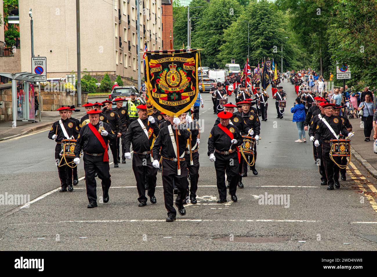 Orange Walk marching through Townhead in Glasgow Stock Photo - Alamy