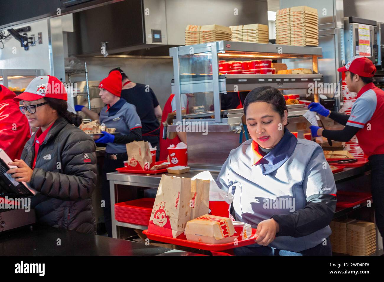 Sterling Heights, Michigan - Workers serve up Chickenjoy fried chicken ...