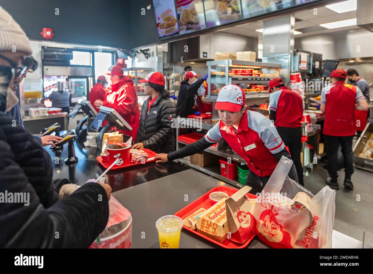 Sterling Heights, Michigan - Workers serve up Chickenjoy fried chicken ...