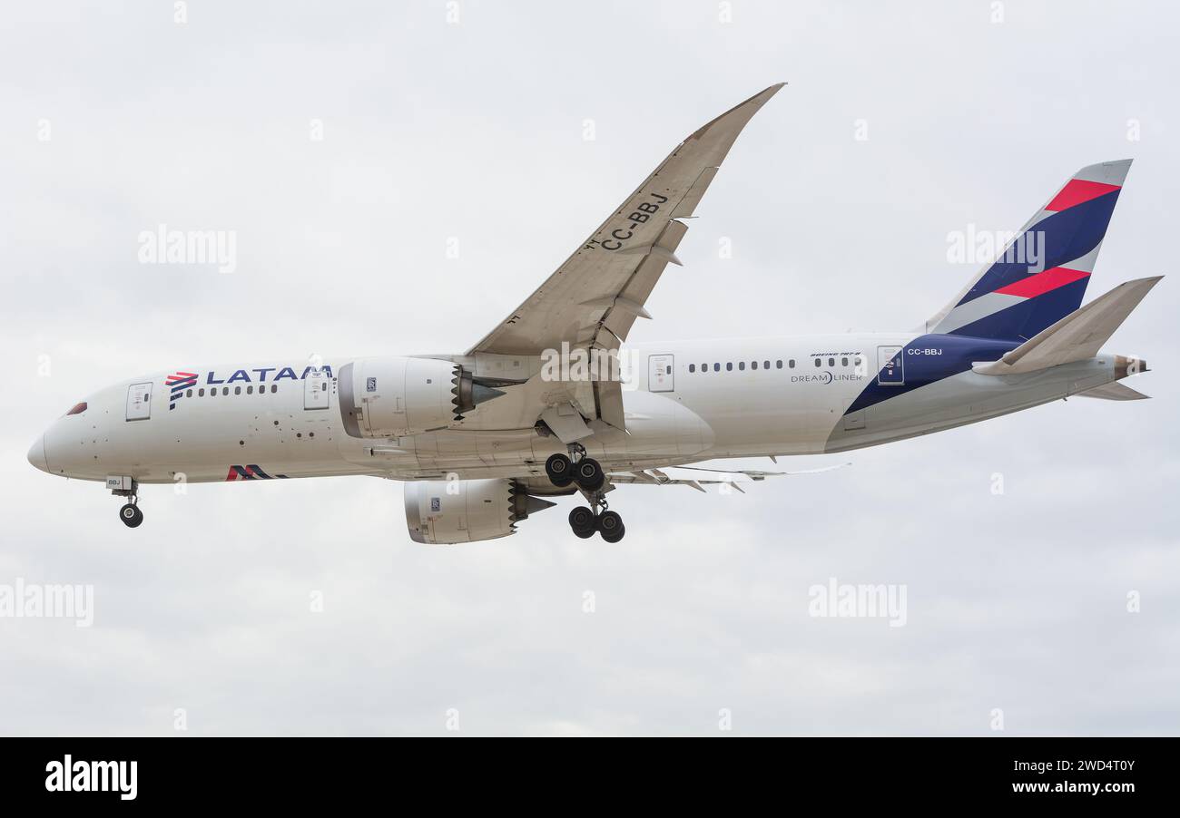 Passenger airplane with landing gear down taking off in the sky Stock ...