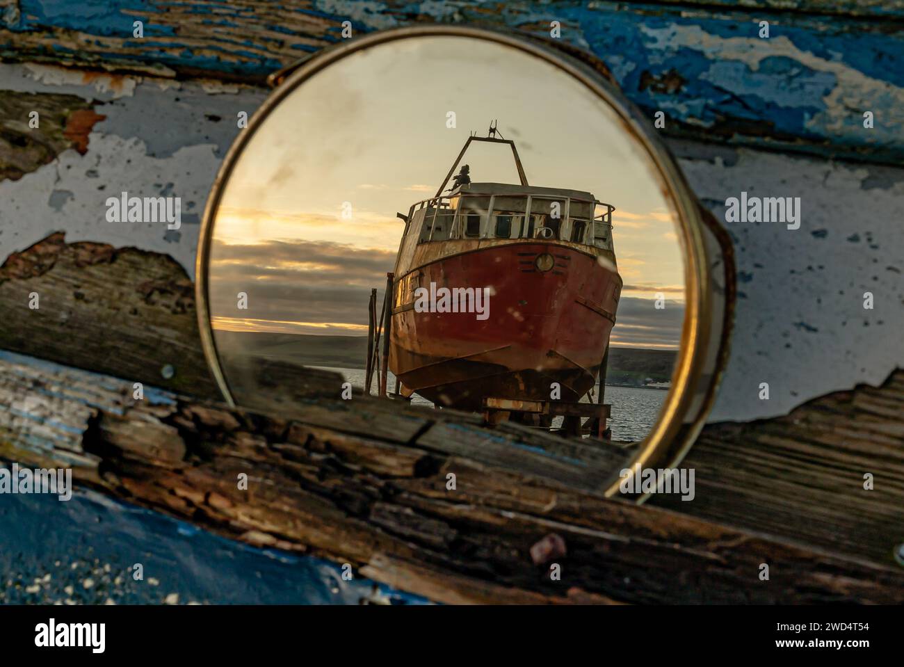 A fishing boat reflection in the blue sky Stock Photo - Alamy