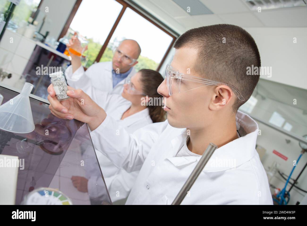 apprentices and curiosity at work Stock Photo - Alamy