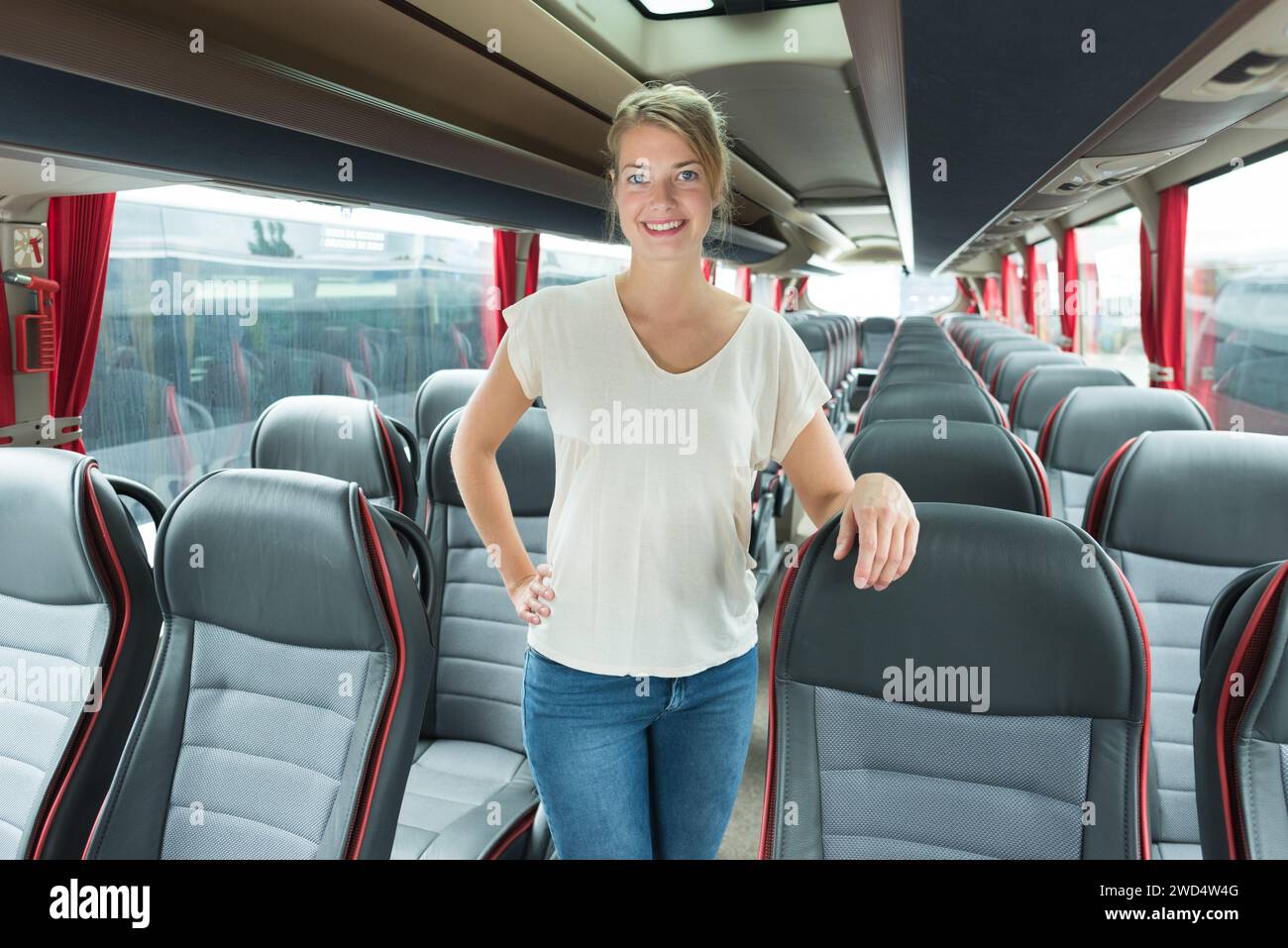 portrait of female bus driver in her bus Stock Photo - Alamy