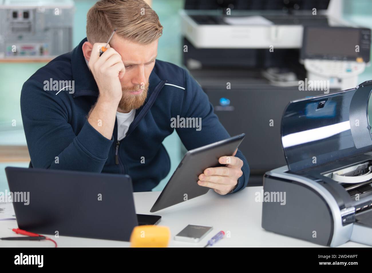 Technician man repairing photocopy hi-res stock photography and images ...