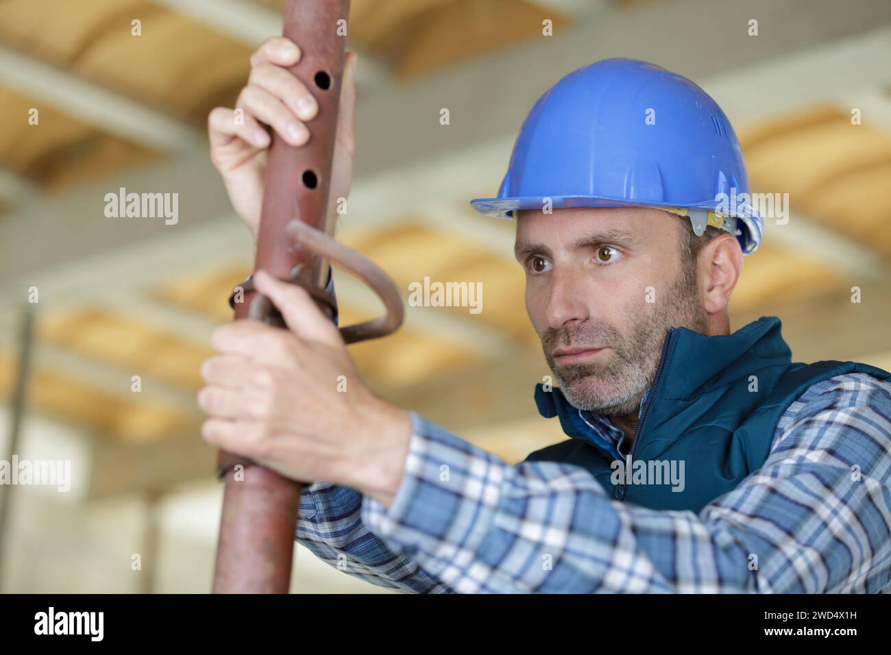 male worker fixing a water pipe Stock Photo - Alamy