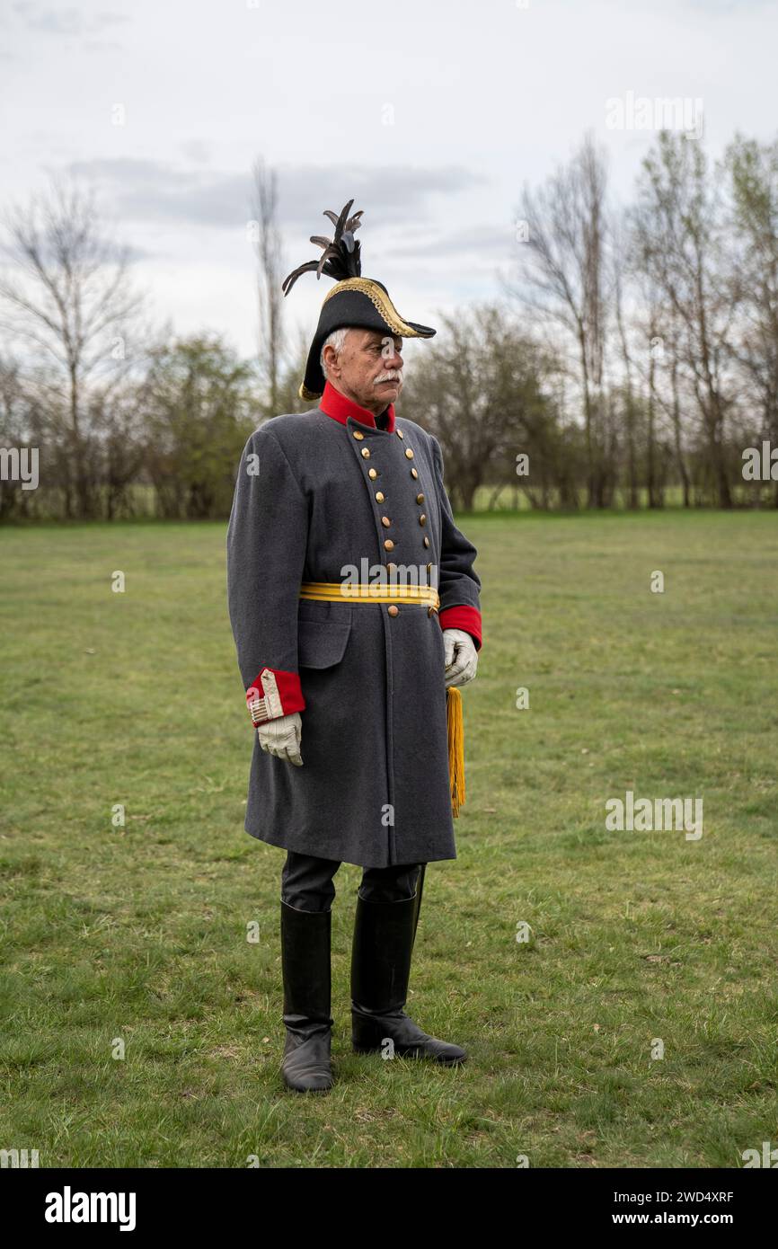 Military officer's outfit. Imperial-royal gunner in bicorne hat. The ...