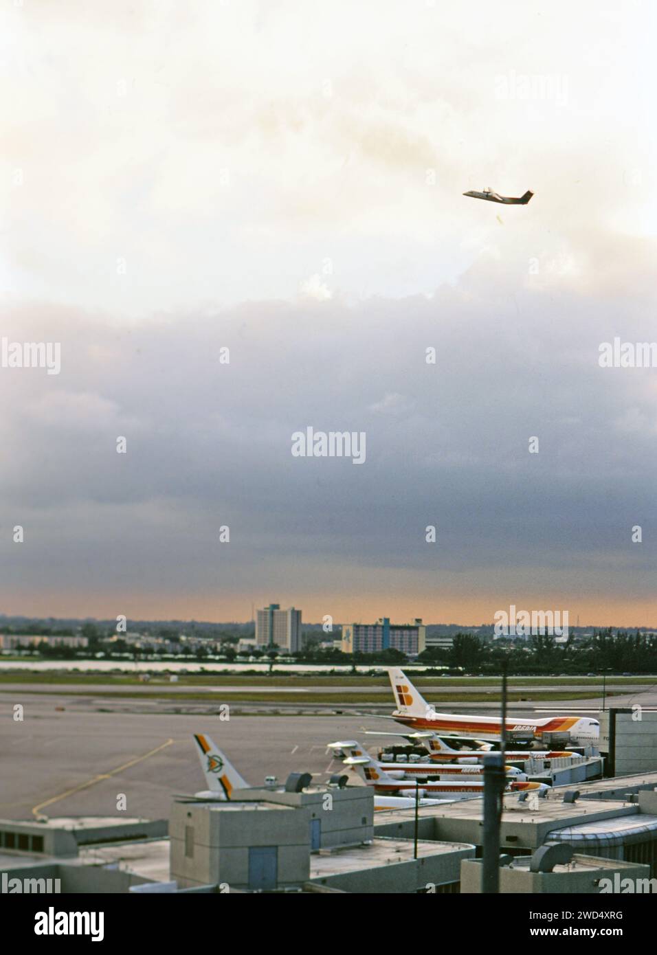 Miami International Airport: Silhouette of an airplane after take off ...