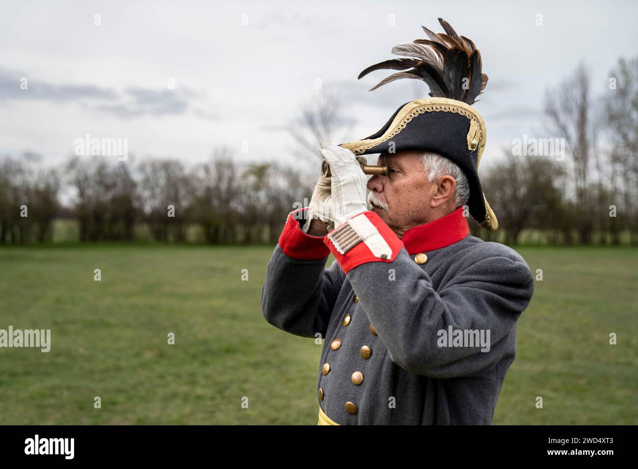 Military officer's outfit. Imperial-royal gunner in bicorne hat. The ...