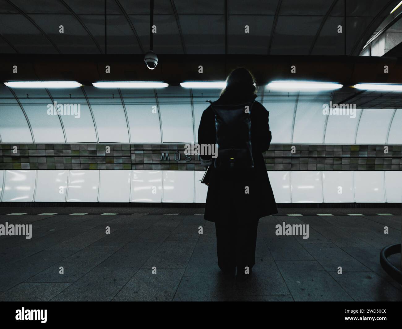 Seen from behind modern female hi-res stock photography and images - Alamy