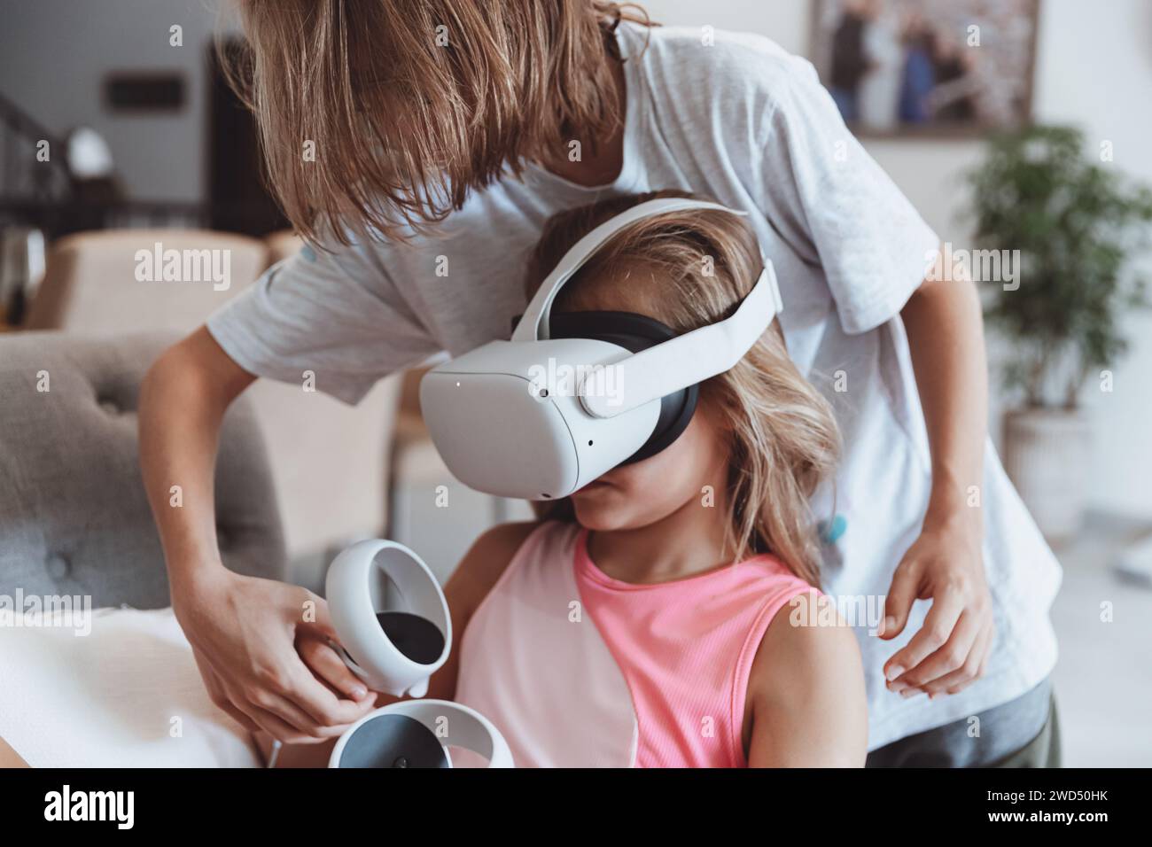 Brother and Sister Playing Video Game Stock Photo - Alamy