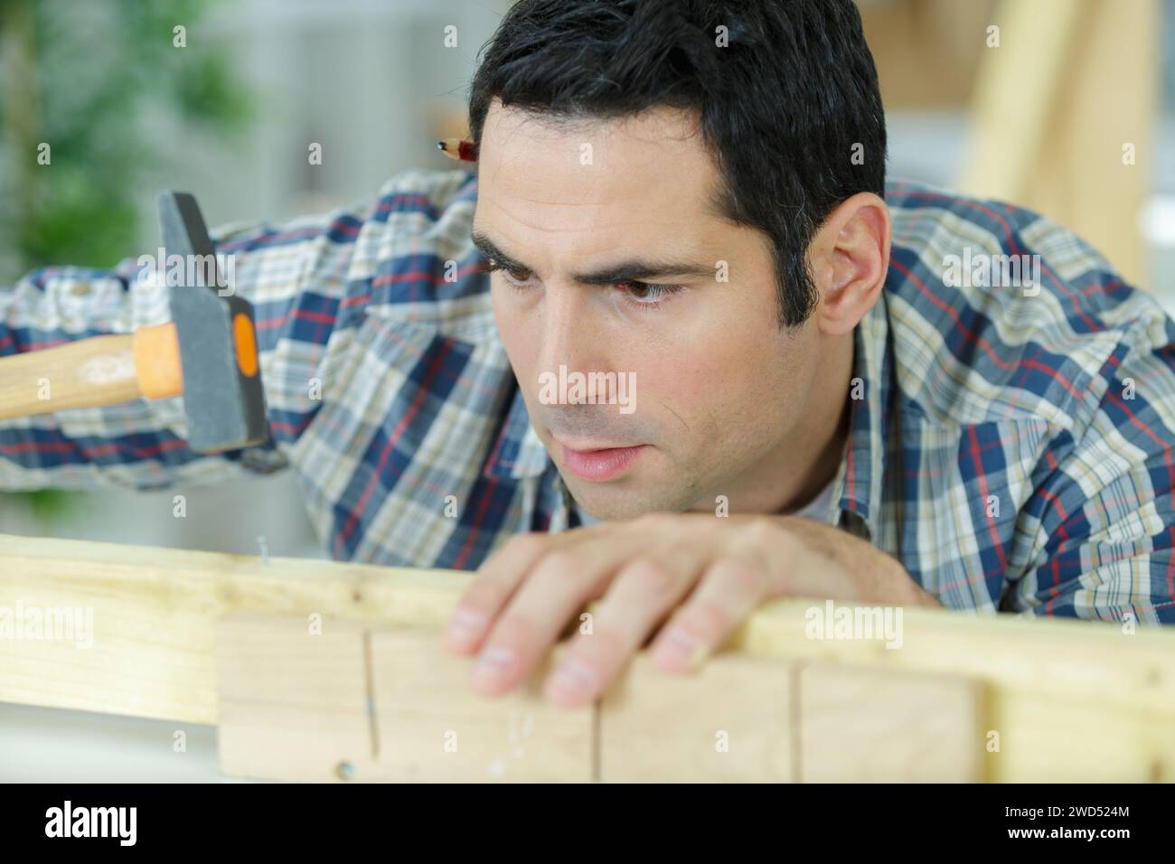 Carpenter hammer nail working table hi-res stock photography and images ...