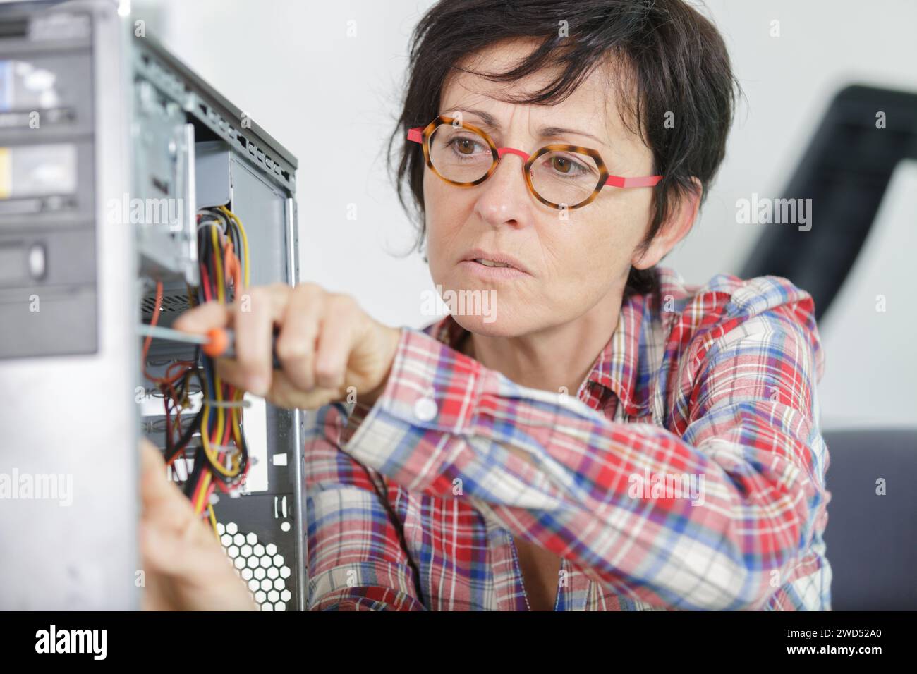 Concentrated female engineer working hi-res stock photography and ...