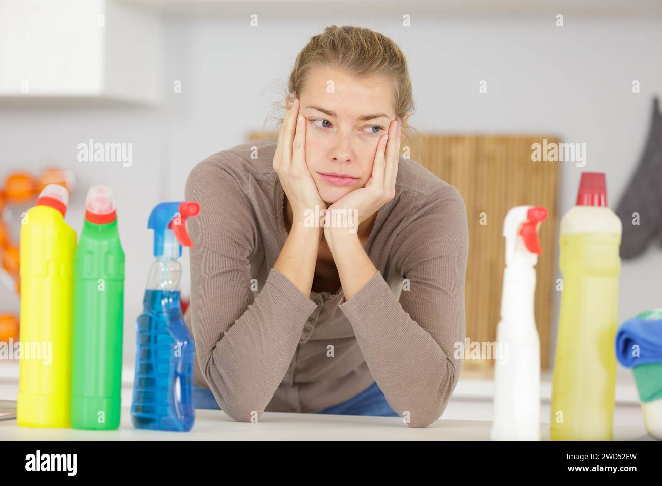 portrait of a bored female house cleaner Stock Photo - Alamy