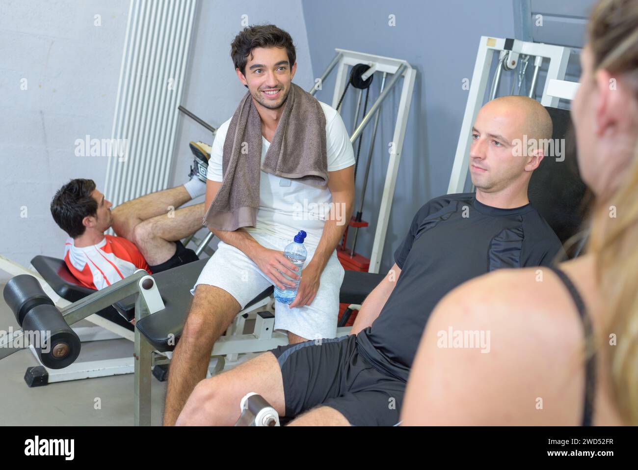 portrait of man being distracted during exercise Stock Photo - Alamy