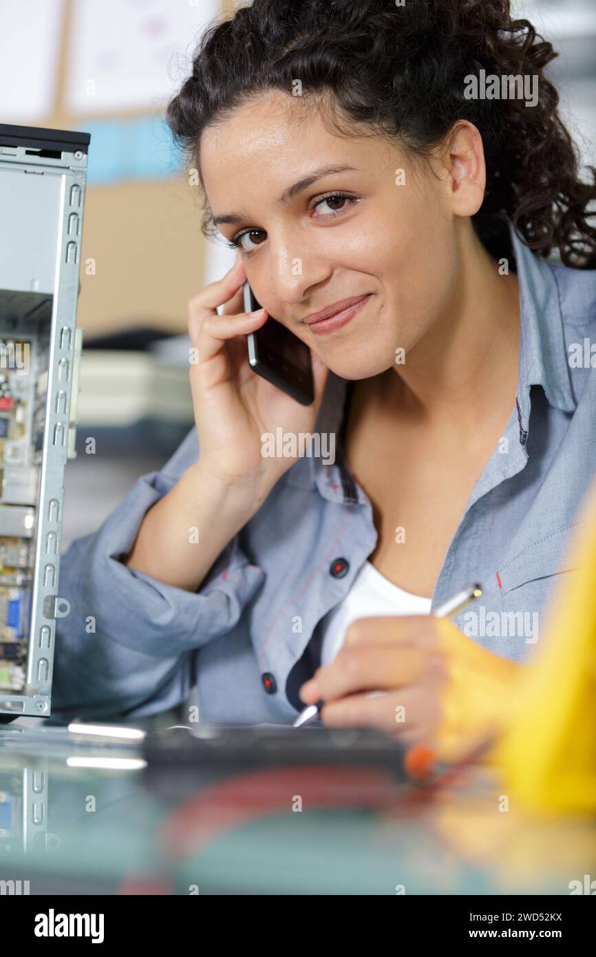 woman while fixing pc in data center Stock Photo - Alamy