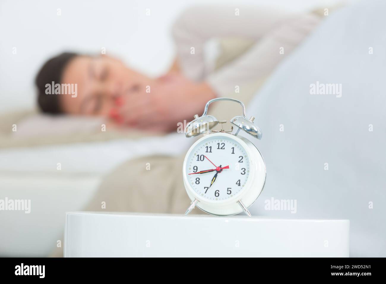 sleepy young woman waking up Stock Photo - Alamy