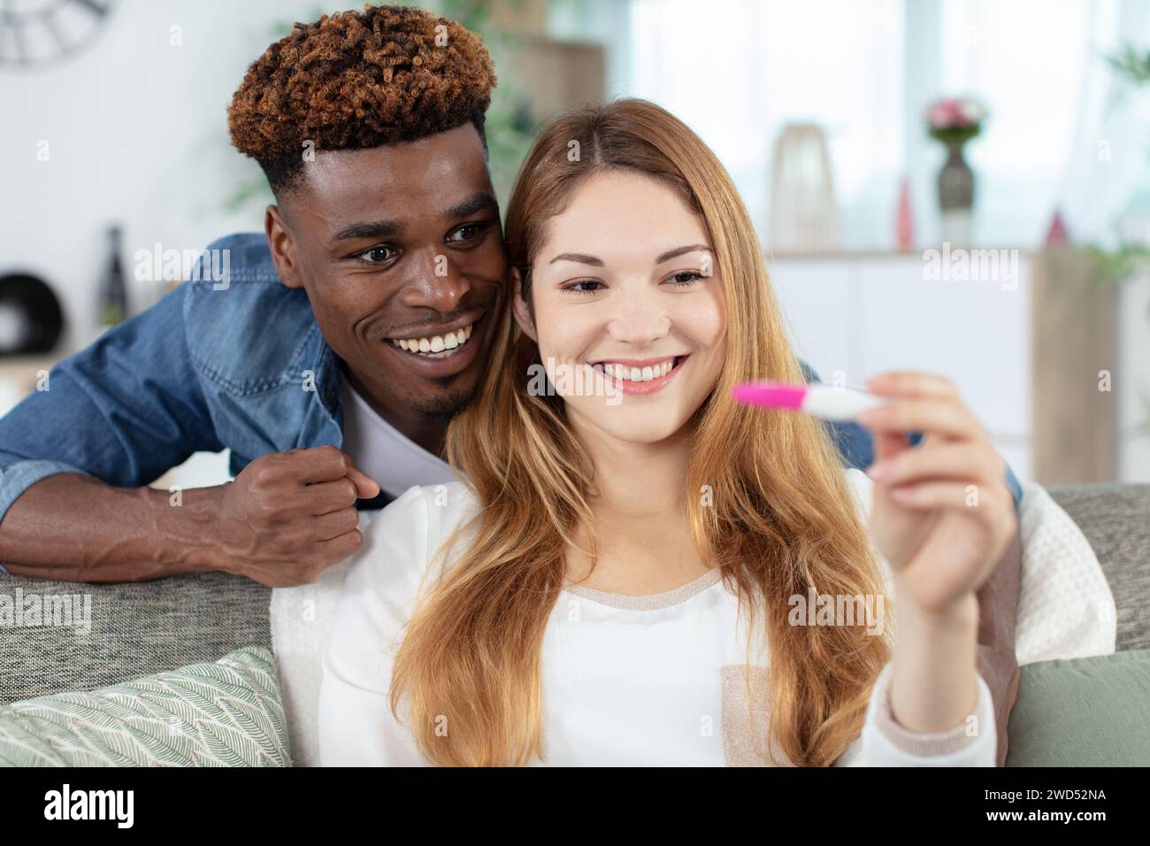 happy couple finding out results of a pregnancy test Stock Photo - Alamy