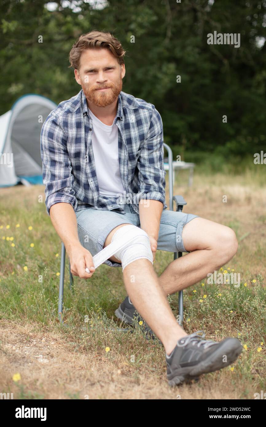 Man camping accident hi-res stock photography and images - Alamy