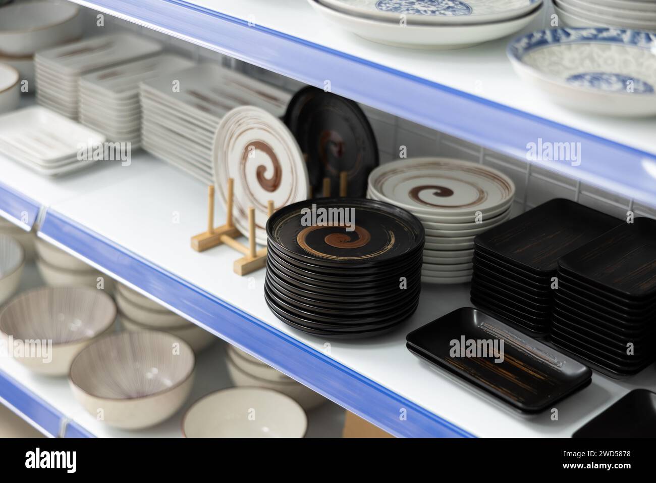 In cookware department, plates of various shapes and sizes, with ...