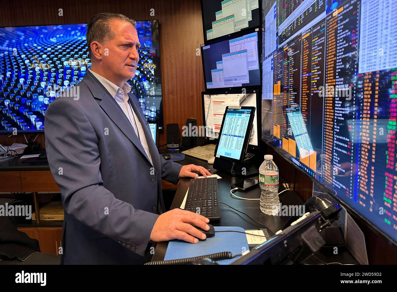 Traders work on the New York Stock Exchange floor in New York on ...