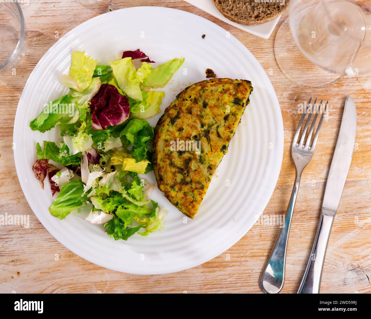 Spinach omelette served for breakfast on platter Stock Photo - Alamy