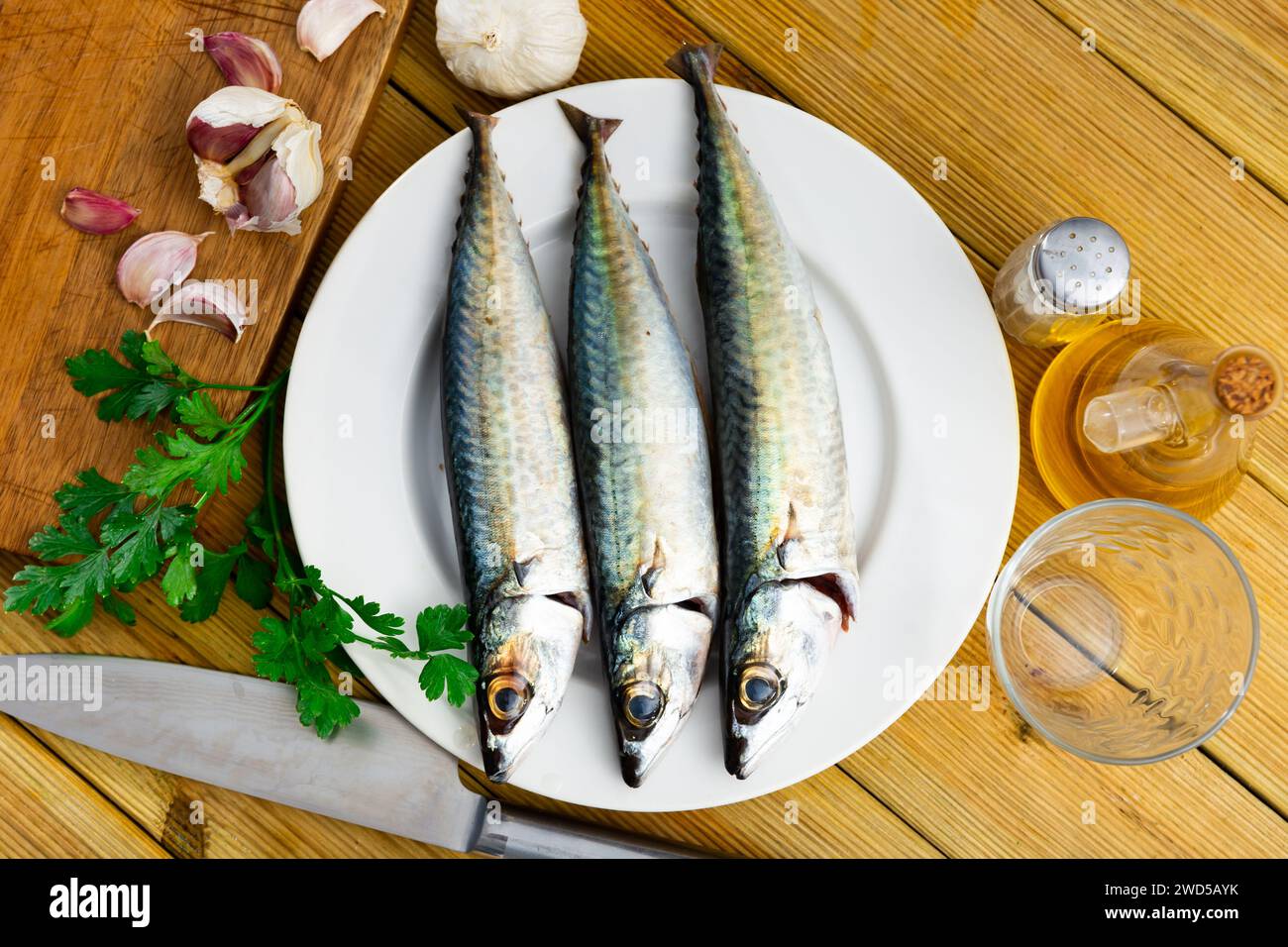 Raw mackerel fish served to table Stock Photo - Alamy