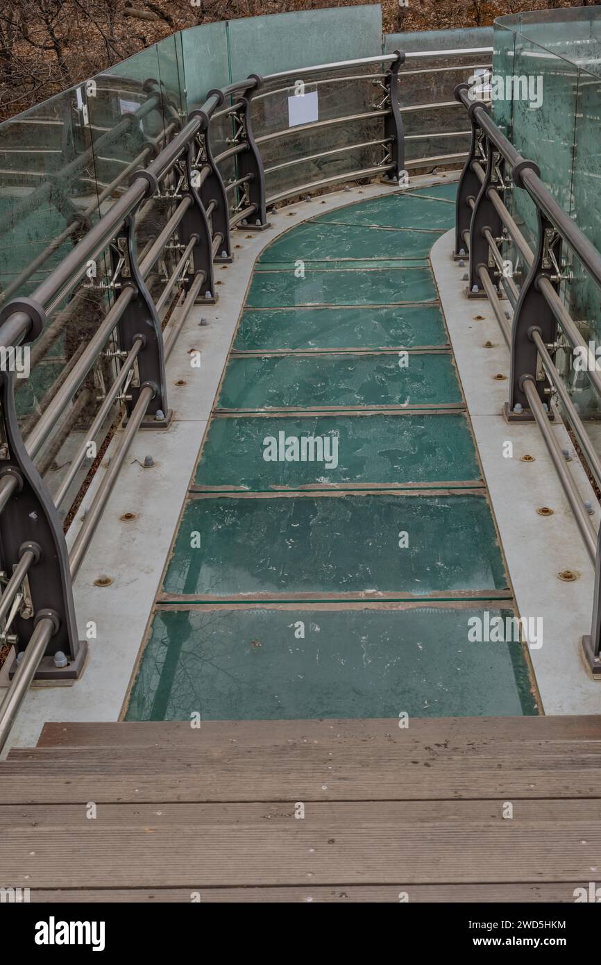 Glass walkway of observation platform in public park. Located at Jaein ...