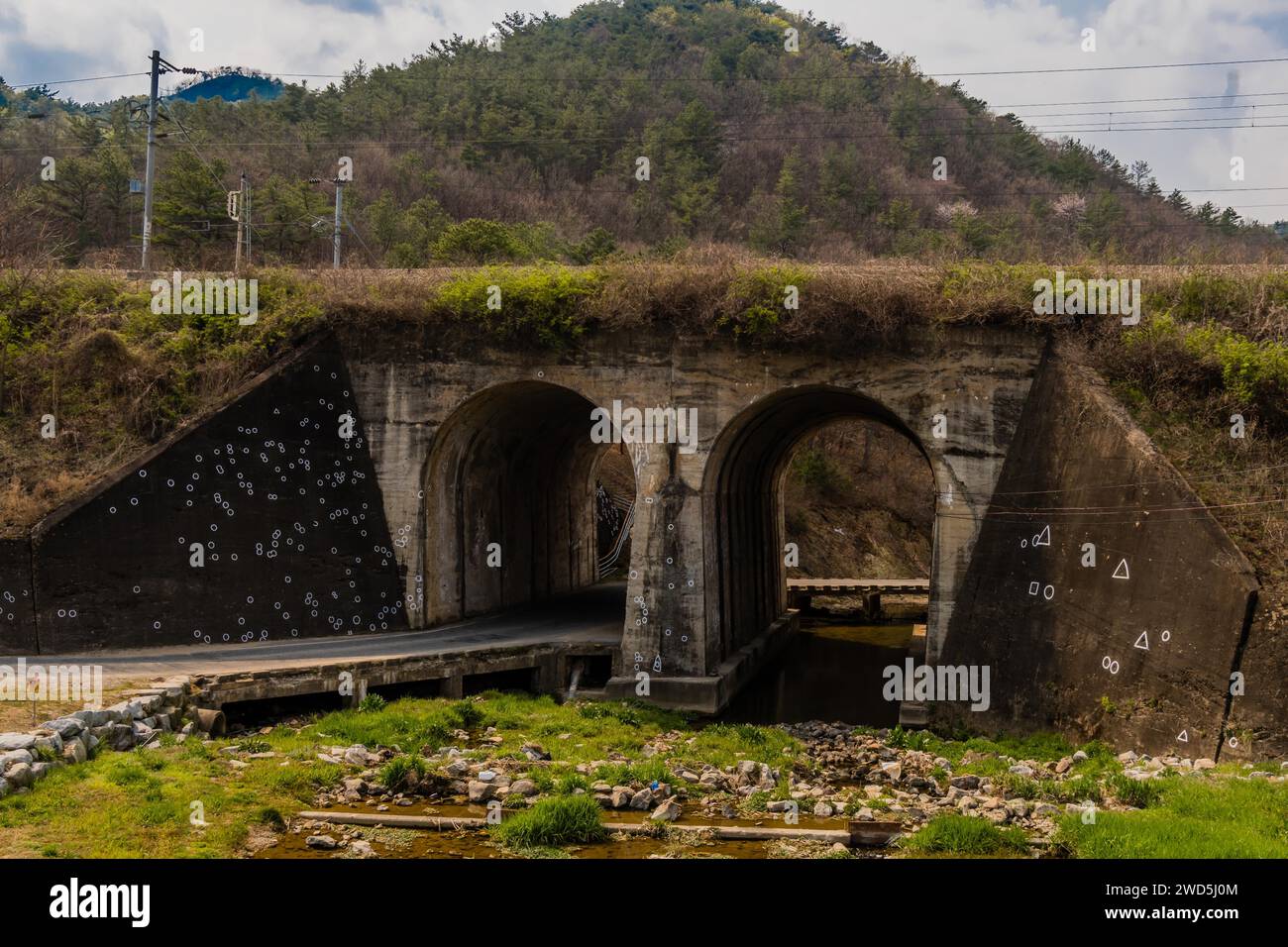 Railroad arch bridge in Hwanggan, South Korea with circles and ...